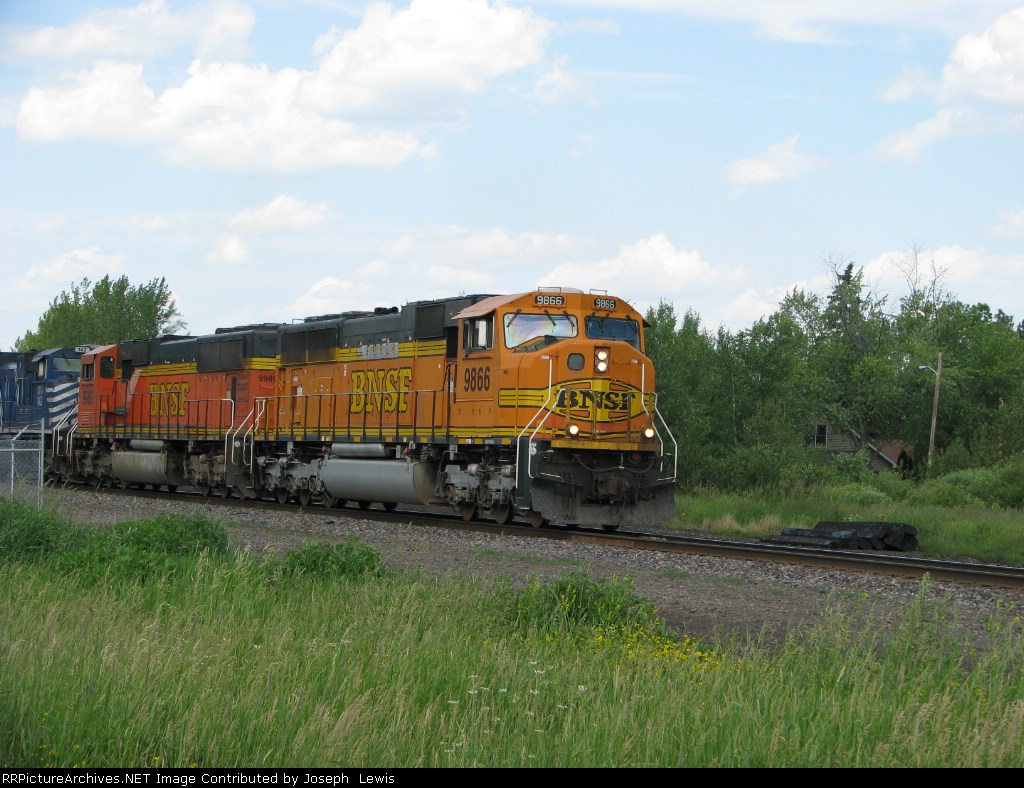 BNSF 9866 leads outbound MERC Coal Train